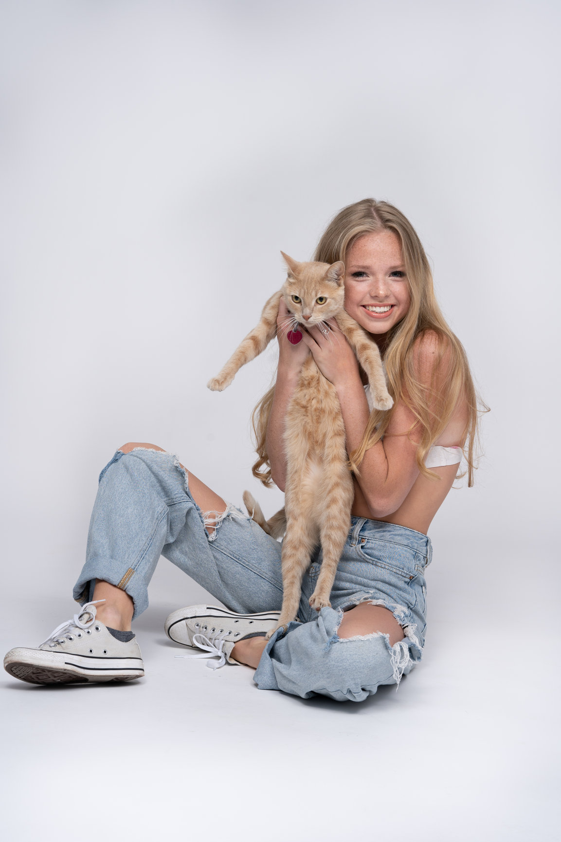 Top tips for taking senior portraits with pets! - JW Portrait Studio